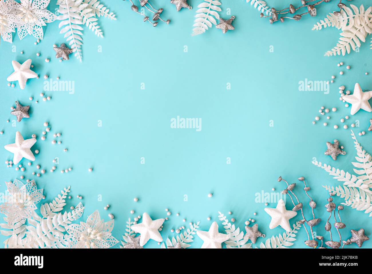Flat lay, blue Christmas background with decor details, copy space ...