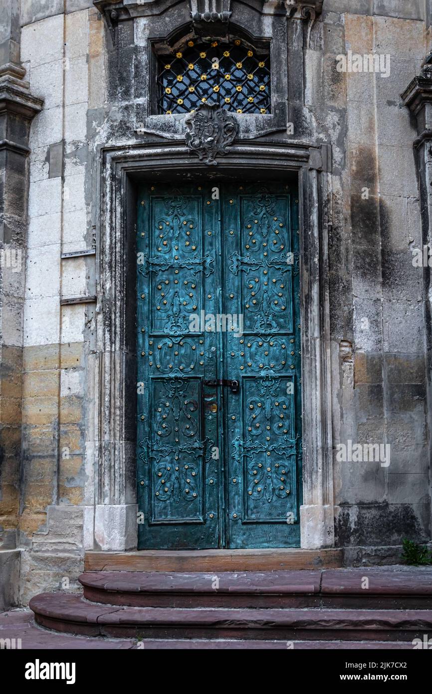 Ancient doors in the cathedral, turquoise old doors Stock Photo - Alamy