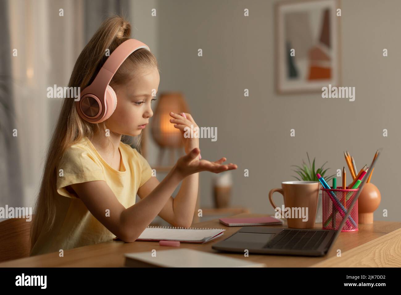 Kid Girl Making Video Call On Laptop Learning At Home Stock Photo - Alamy