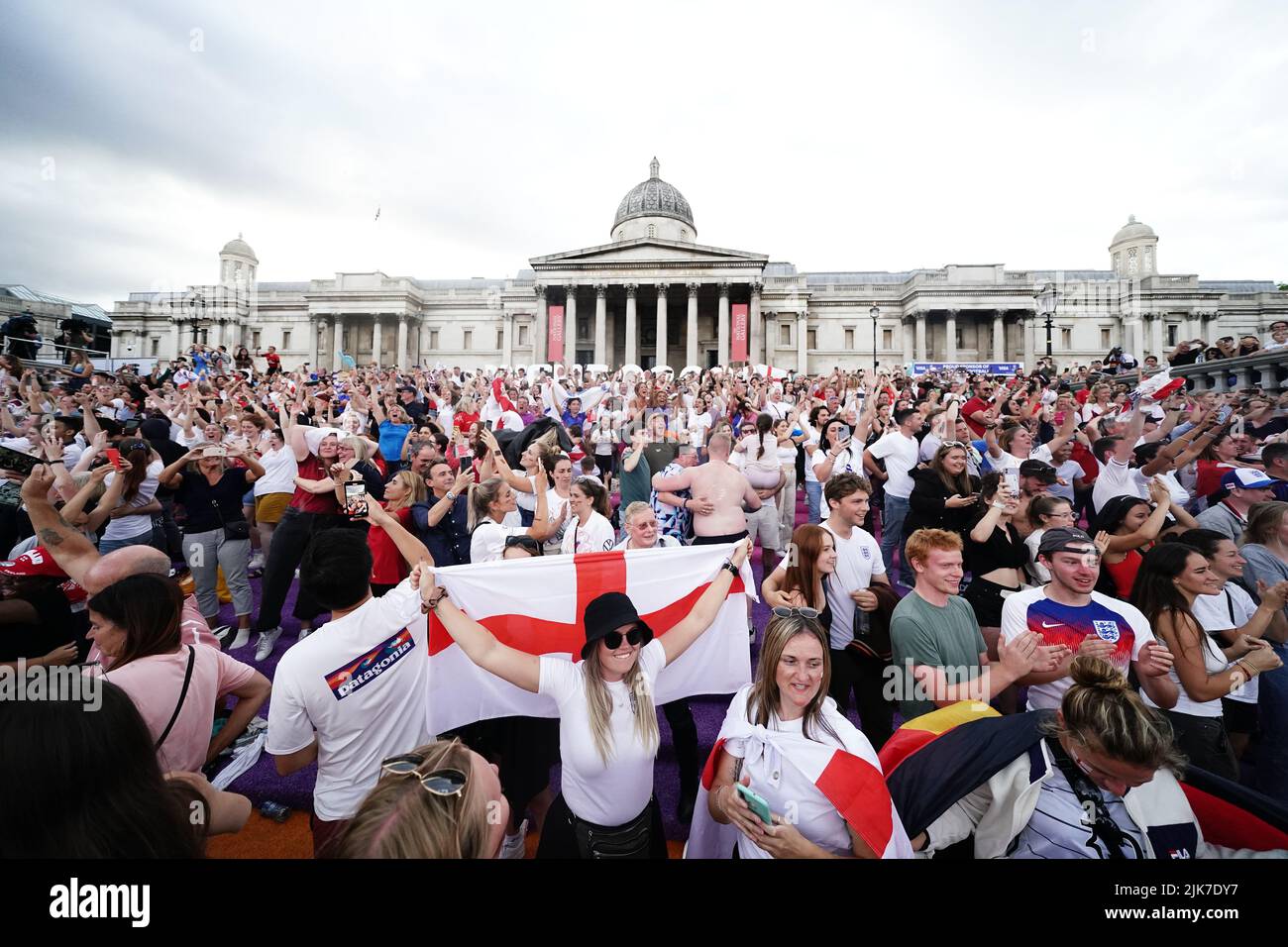 Fans celebrate the final whistle in Trafalgar Square, London, watch ...