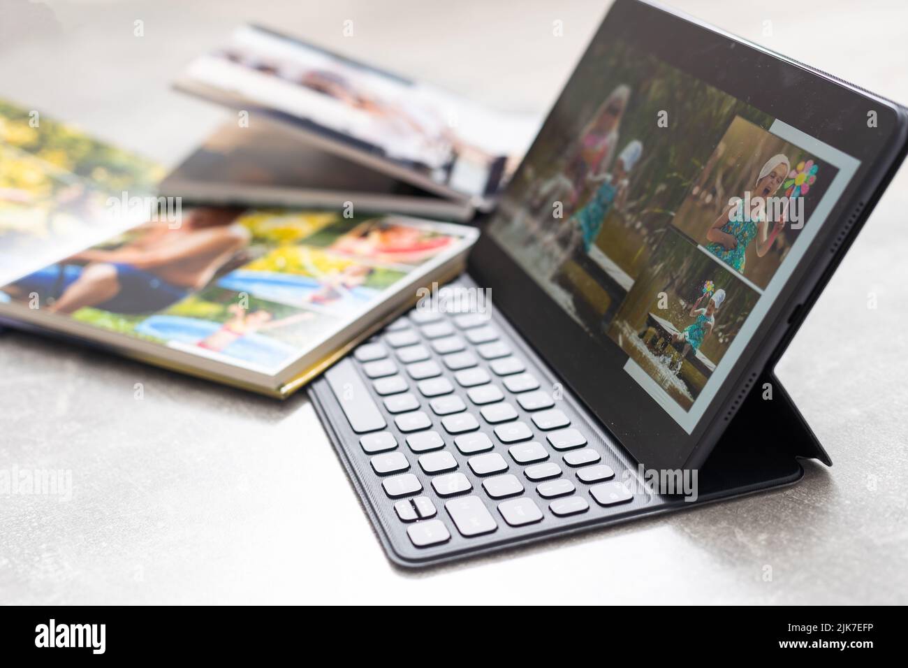 technology, age, memories and people concept. photobook album and ...