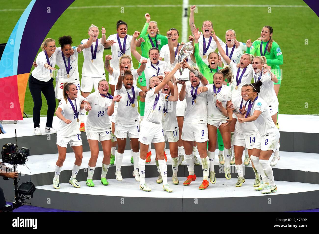 England's Leah Williamson and England's Millie Bright lift the trophy ...