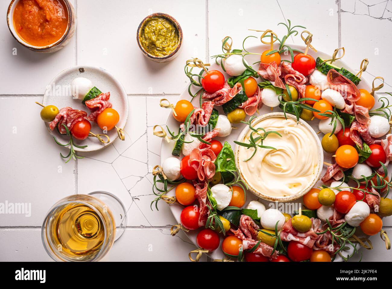 Appetizer and refreshment set. Plate of canapes with vegetables, cheese ...