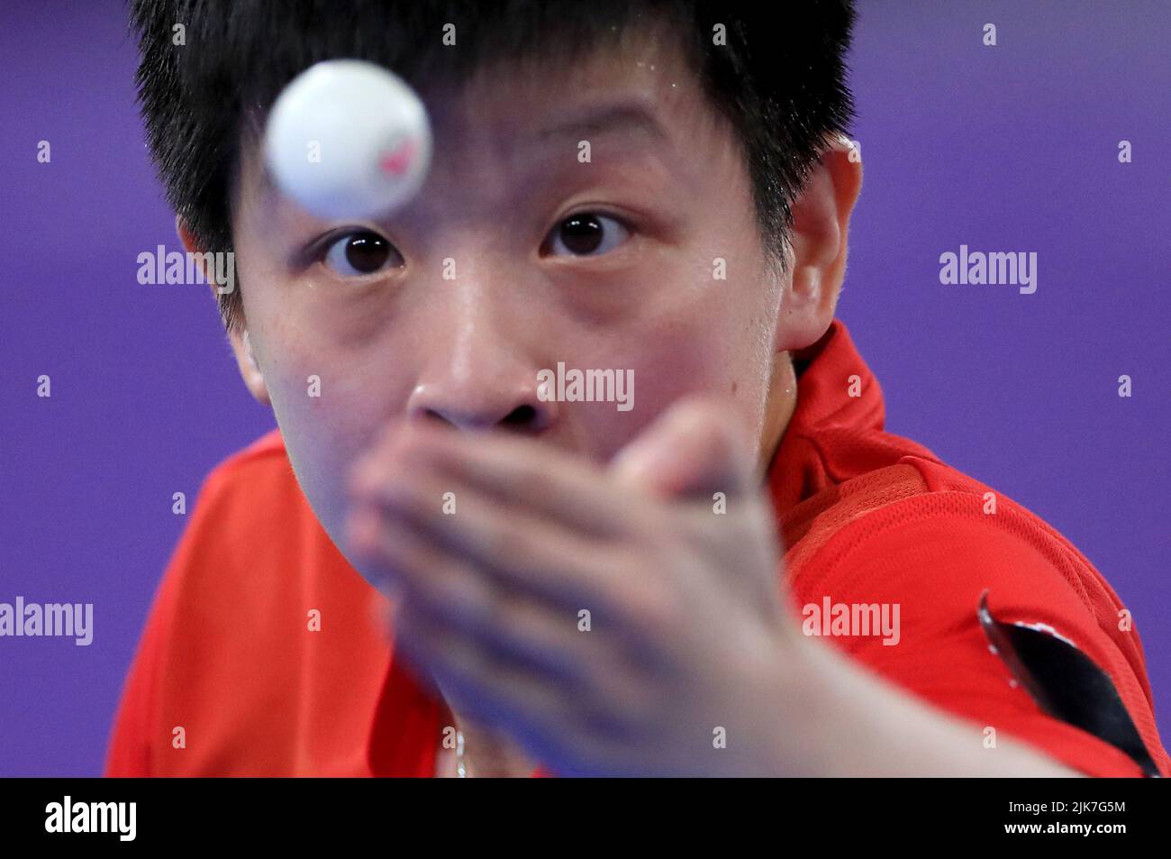 Singapore’s Jian Zeng serves with partner (out of frame) Jingyi Zhou ...