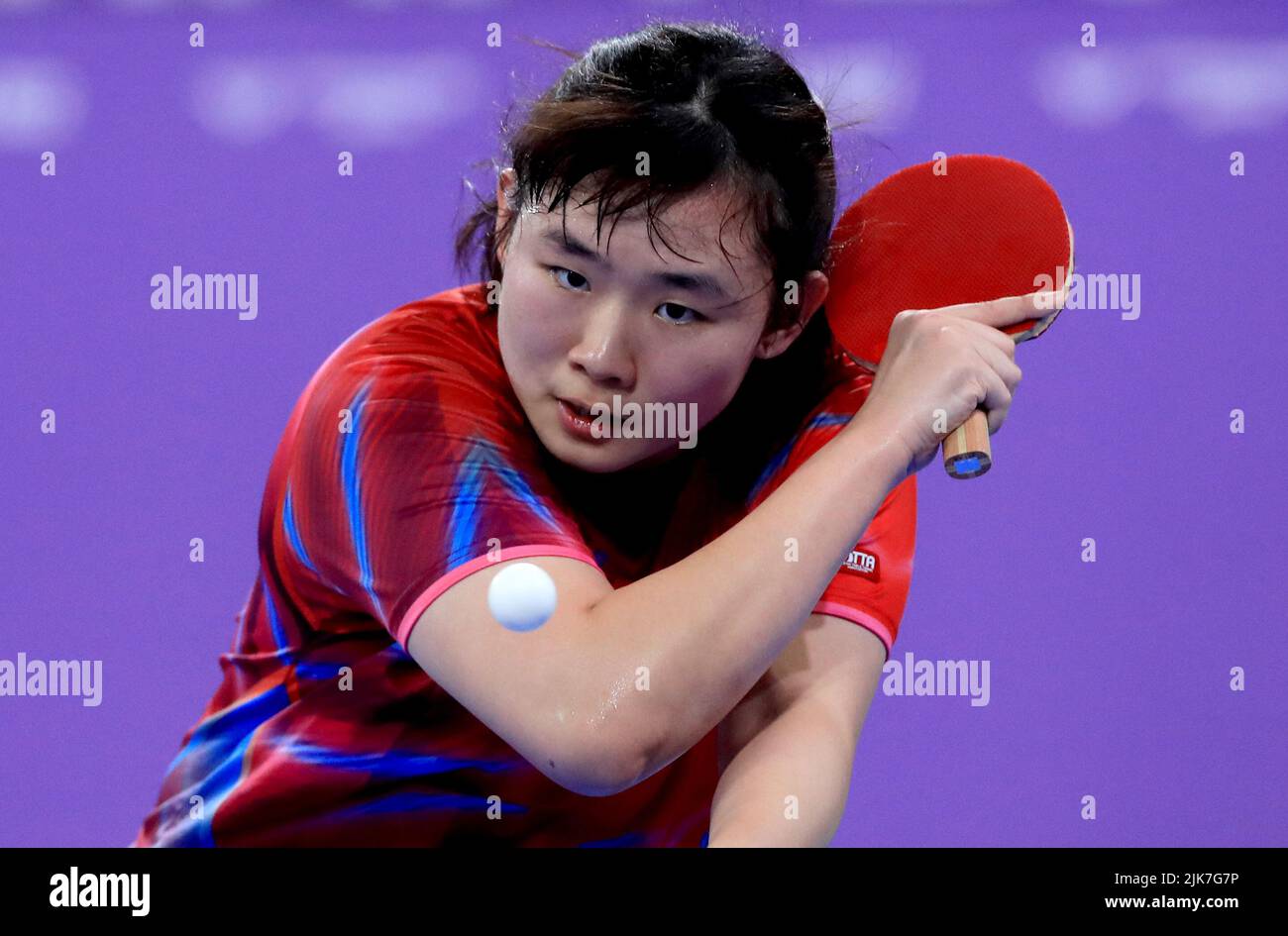 Malaysia’s Li Sian Alice Chang plays a shot against Wales’ Charlotte ...