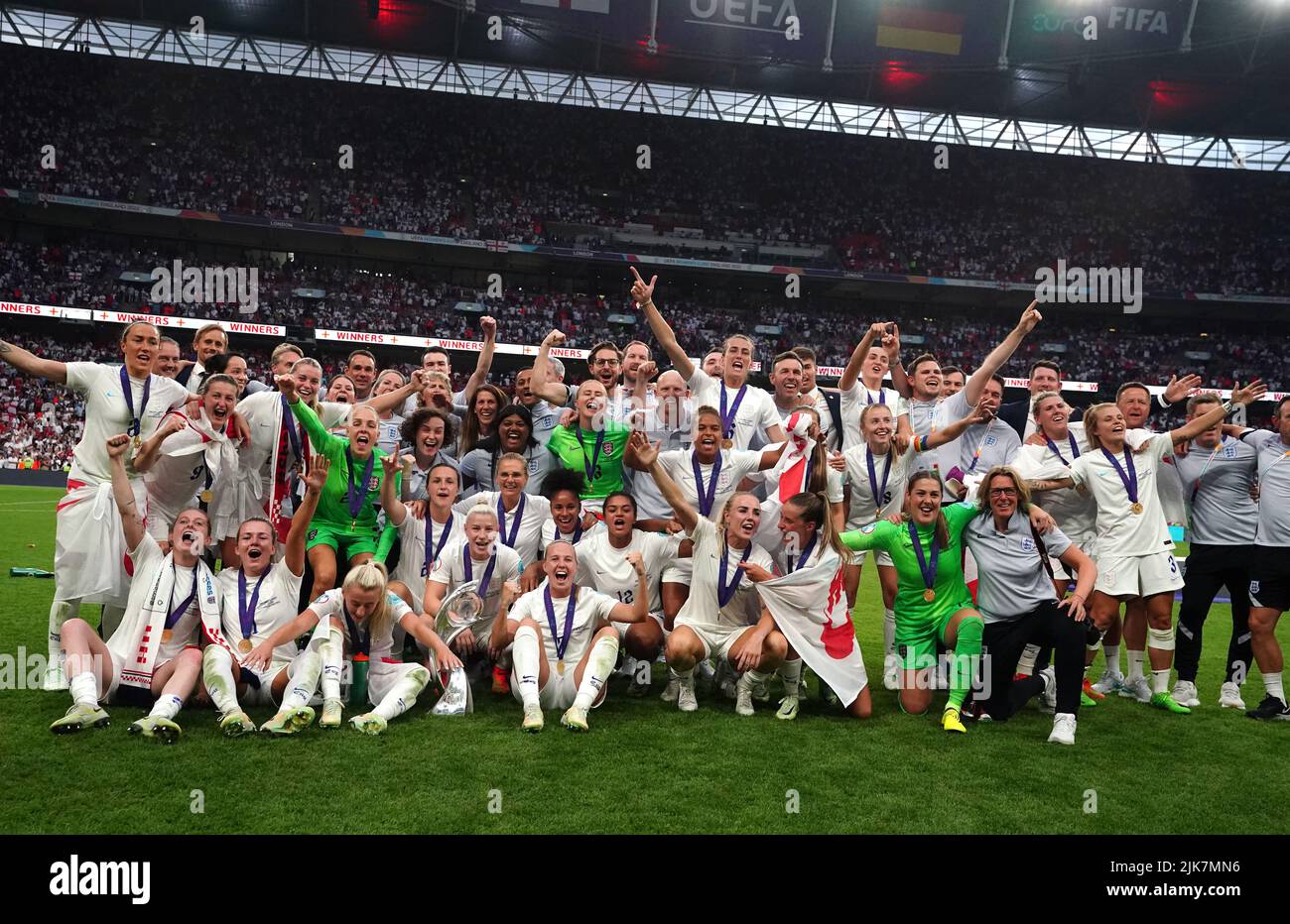 England players celebrate with the trophy following victory over ...