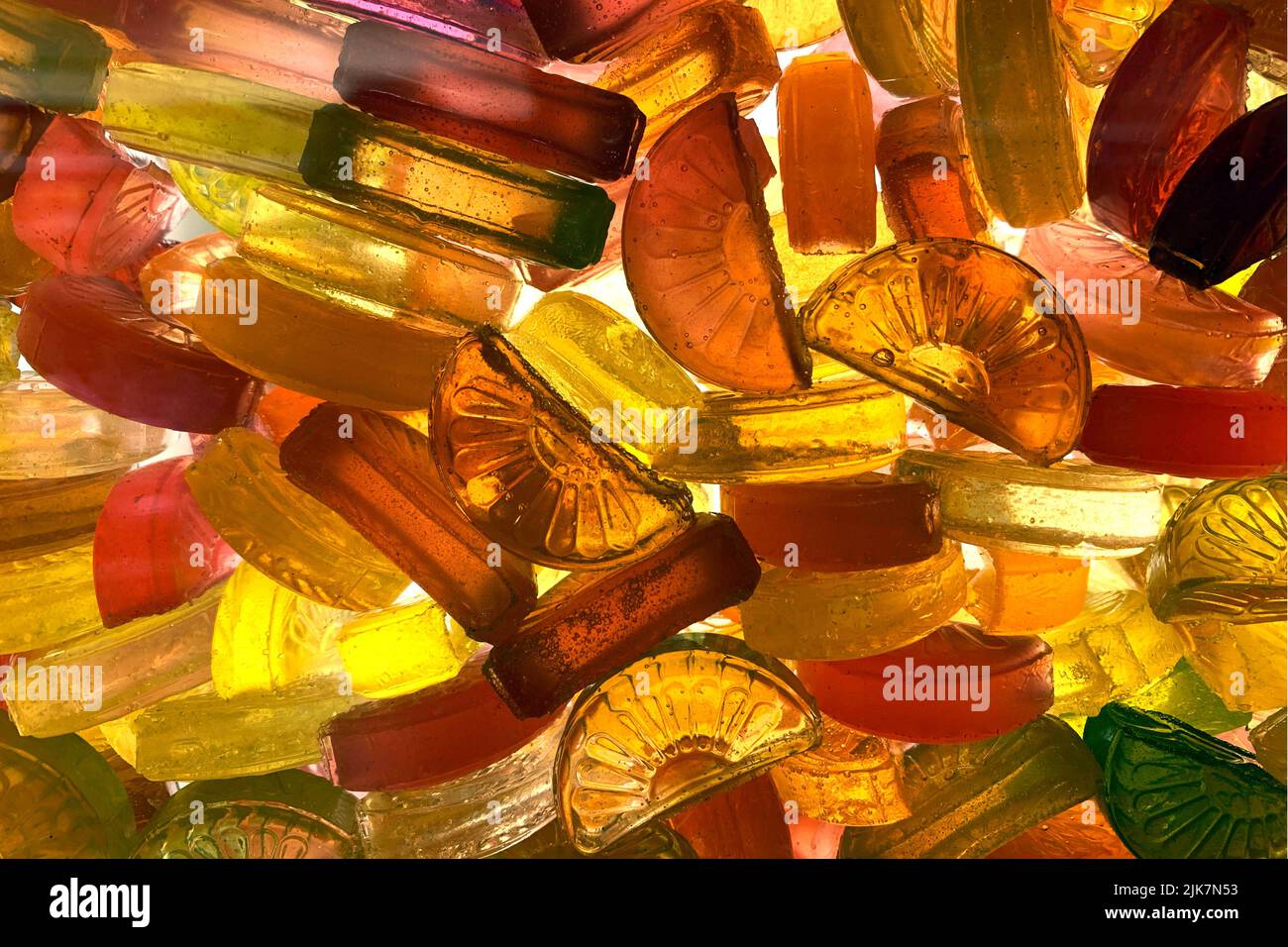 Candy pattern. silhouette of many multi colored yummy bright candies in ...