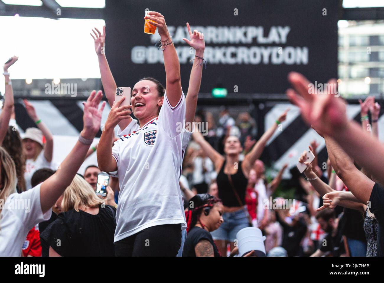 England fans celebrate at the BOXPARK, Croydon as they watch a ...