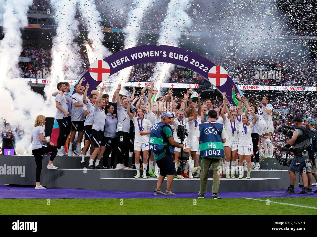 England Players Celebrate With The Trophy Following Victory Over