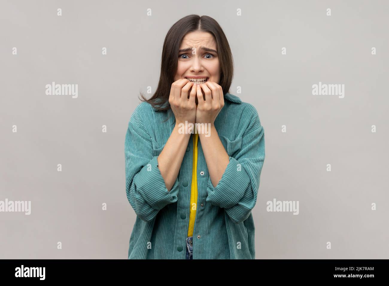 Woman nail biting anxious hi-res stock photography and images - Alamy