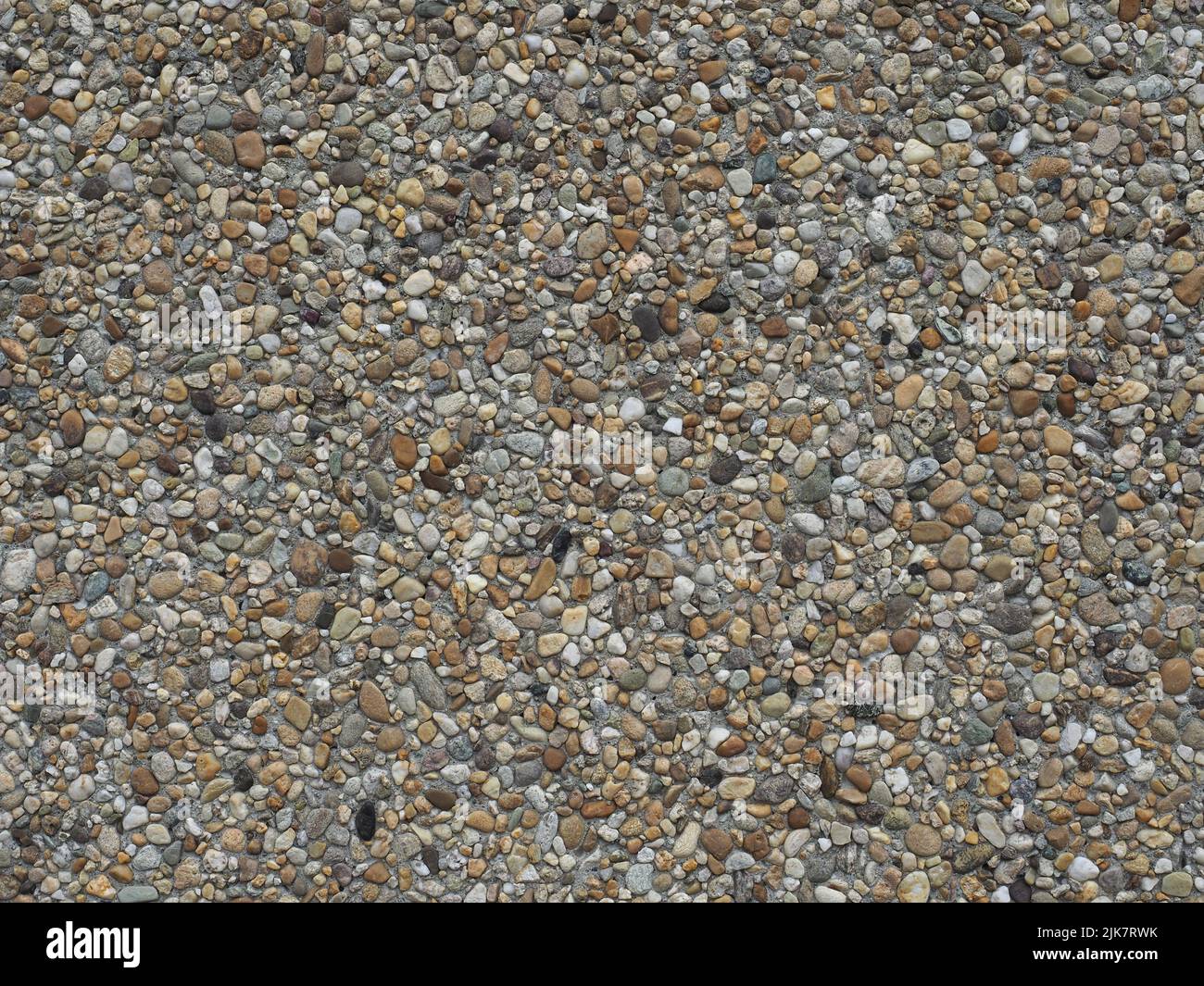 pebbled concrete texture useful as a background Stock Photo - Alamy