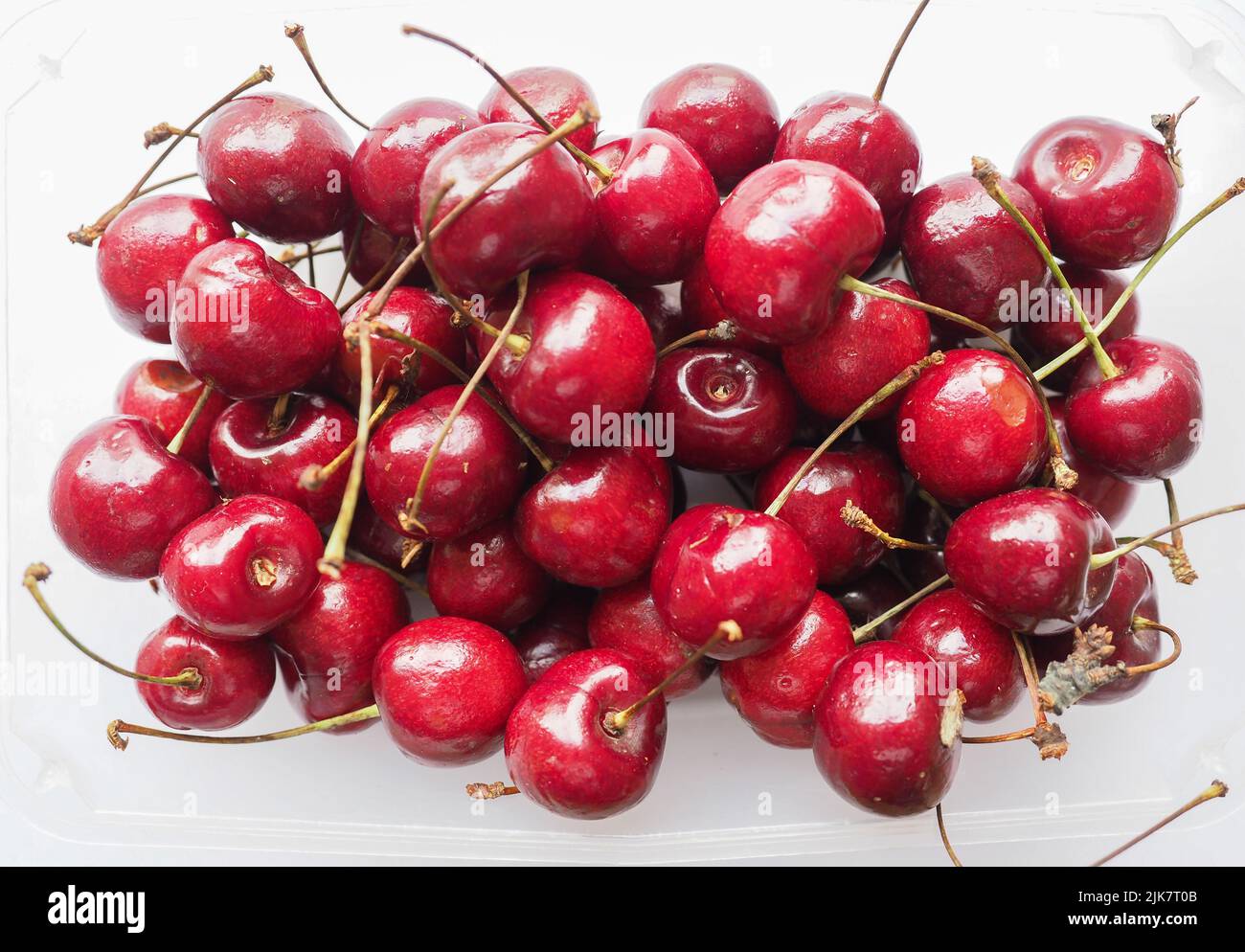 red cherry scientific name Prunum vegetarian fruit food Stock Photo - Alamy