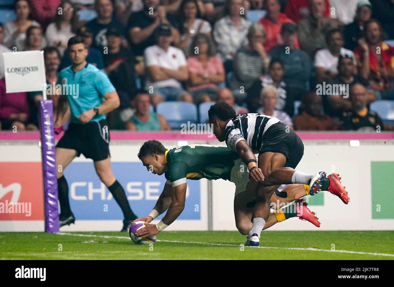 South Africa's Muller Du Plessis scores a try against Fiji in the Men's ...