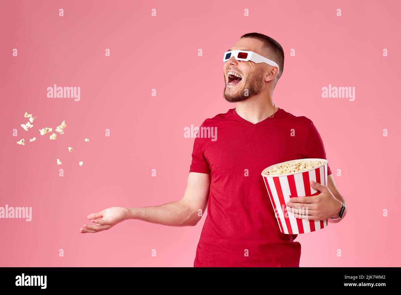 Man throwing popcorn hi-res stock photography and images - Alamy