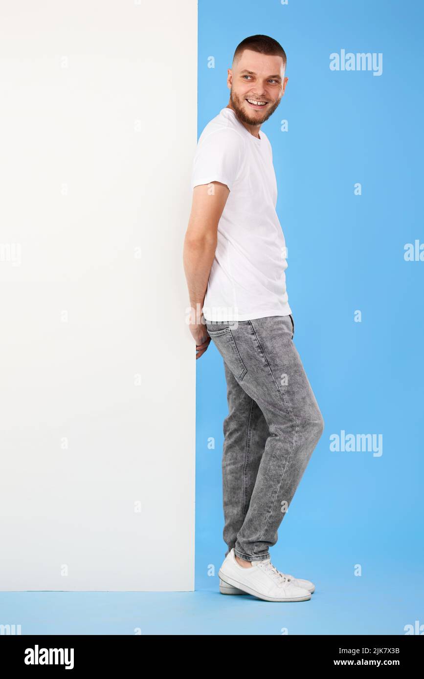 cheerful man holding board with empty copy space Stock Photo - Alamy