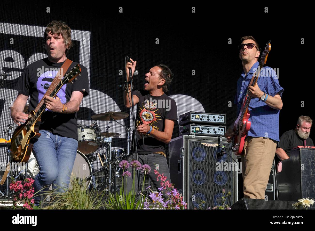 Lulworth, UK. 31st July, 2022. L-R Paul Adrian Banks guitarist and lead ...