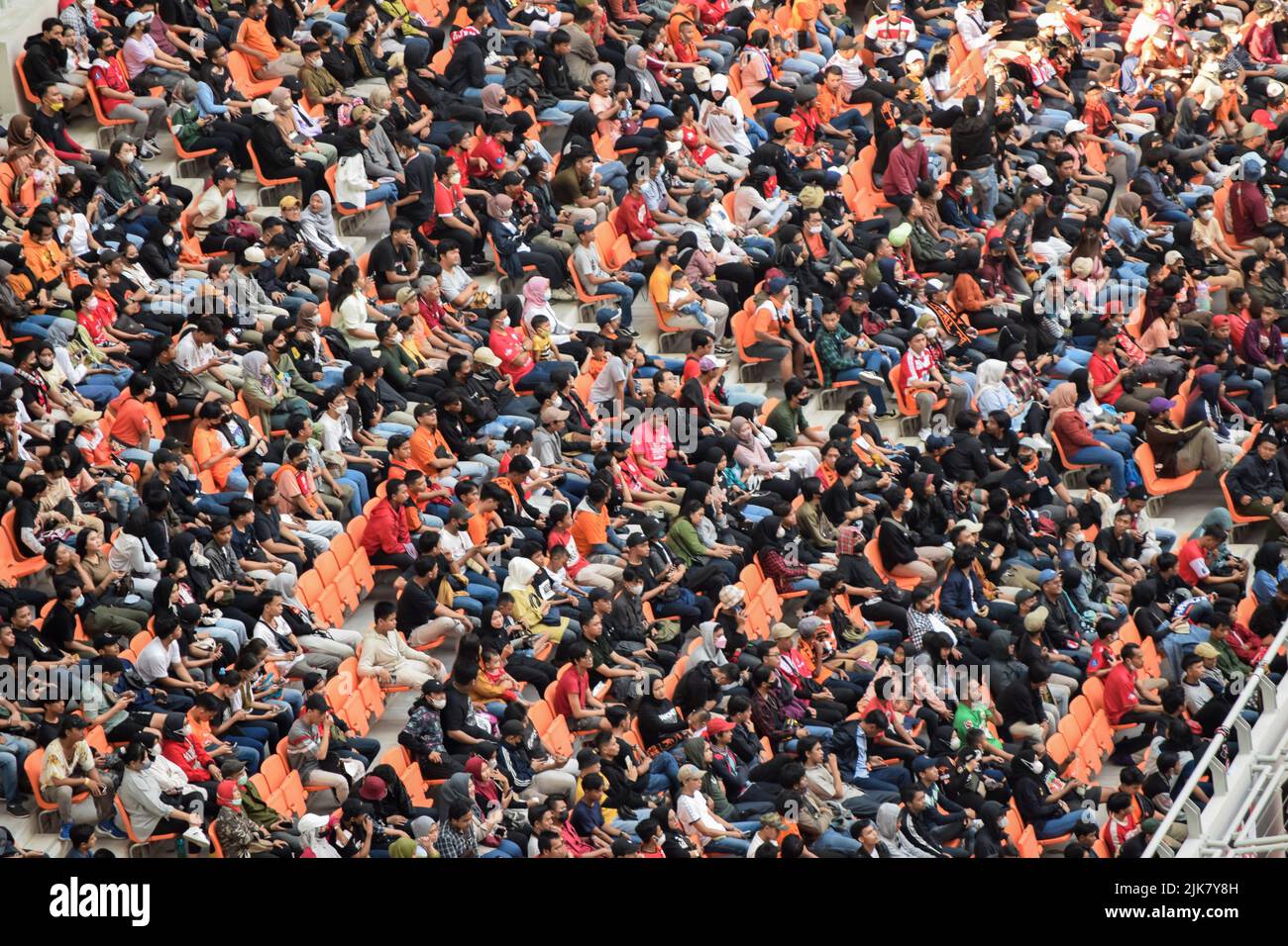 Crowds on Group of fans on the stadium Jakarta International Stadium ...