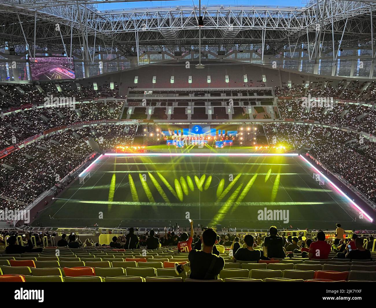 Crowds on Group of fans on the stadium Jakarta International Stadium ...
