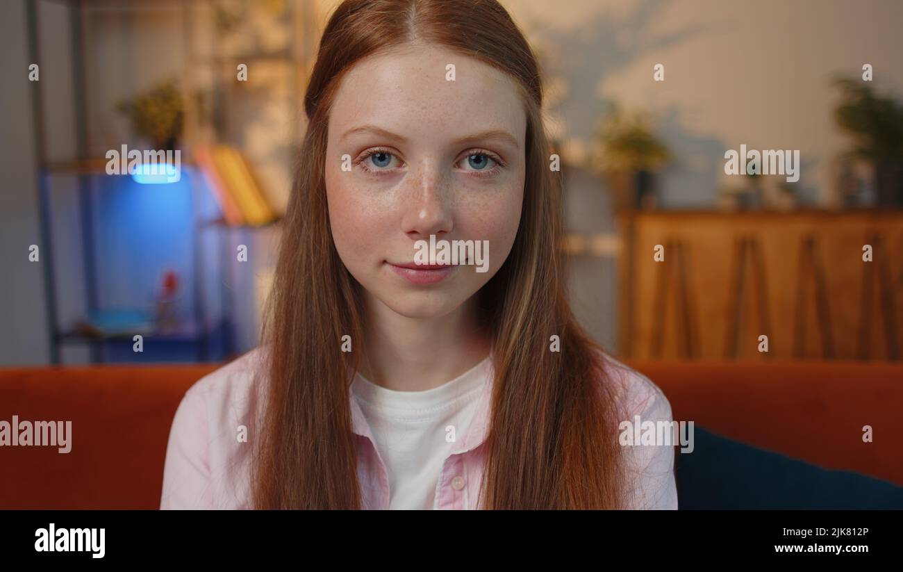 Close-up portrait of happy positive smiling young redhead child girl ...