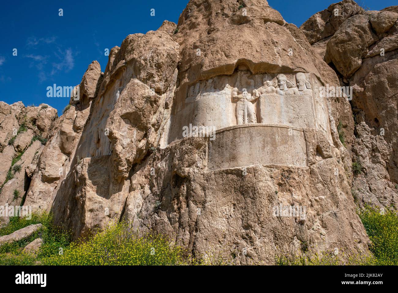 Sandstone rock with carved tombs of persian kings in Necropolis, Iran ...