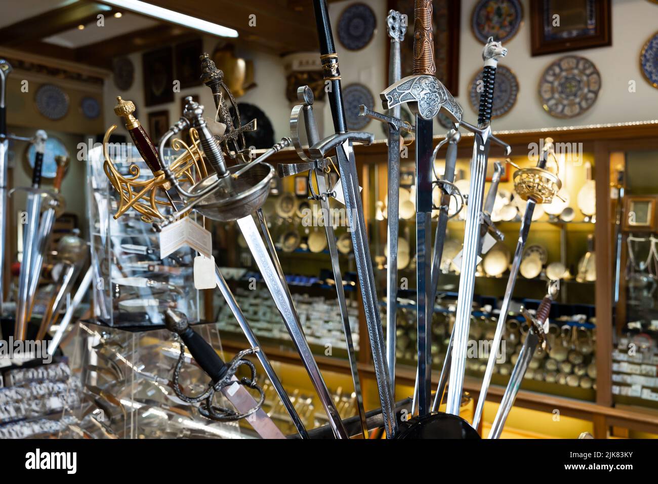 Collection of swords in souvenir shop Stock Photo - Alamy