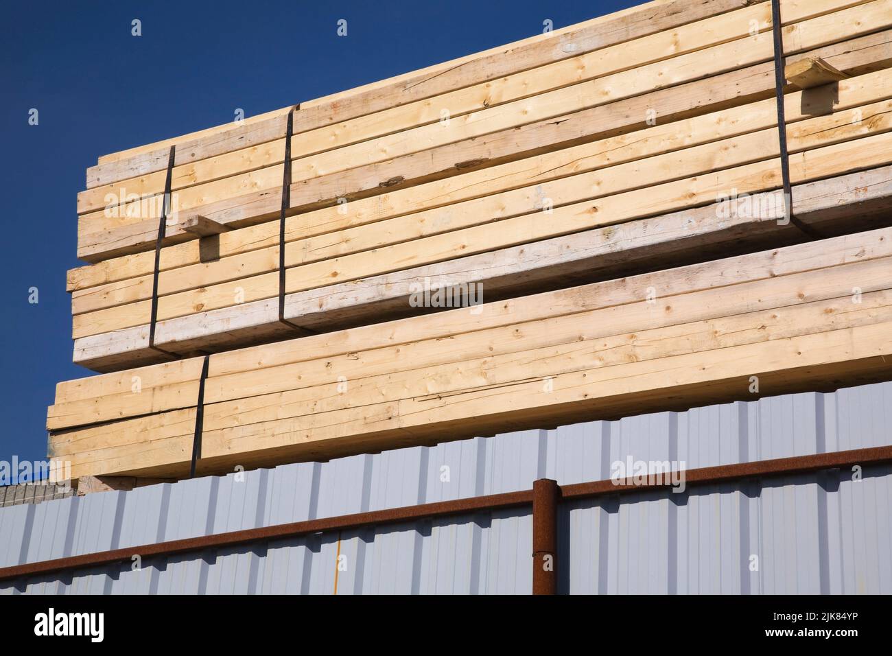 Stacks of tied lumber ready for shipping in a lumberyard Stock Photo ...