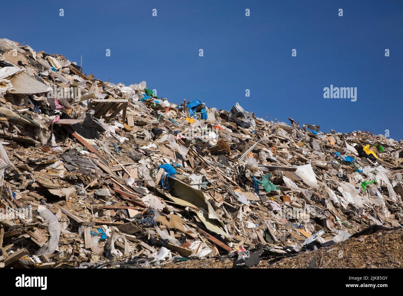 Pile of discarded debris in recycling yard Stock Photo - Alamy