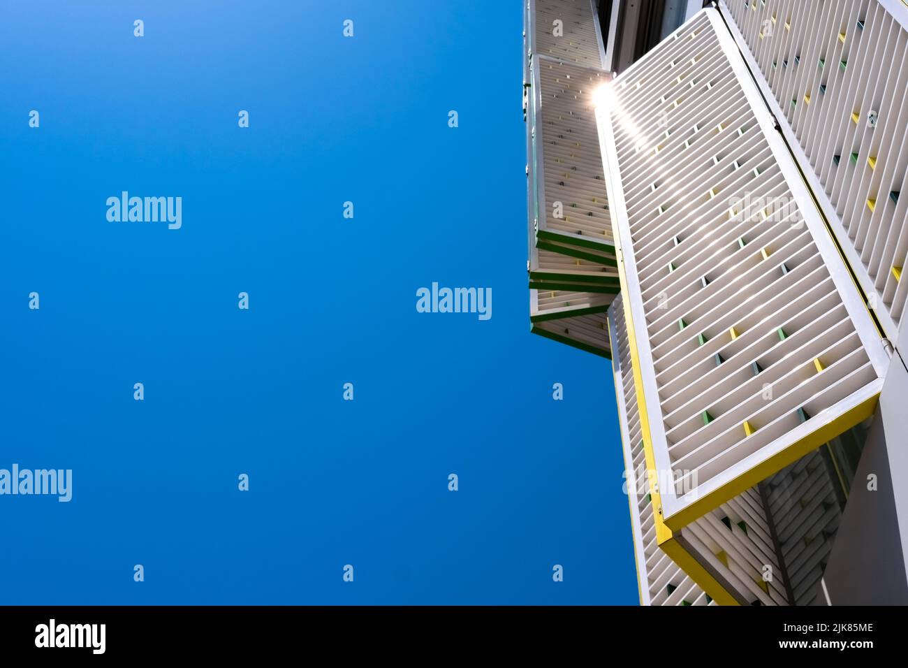 Modern white shutters protect a building from the sun, sustainable ways ...