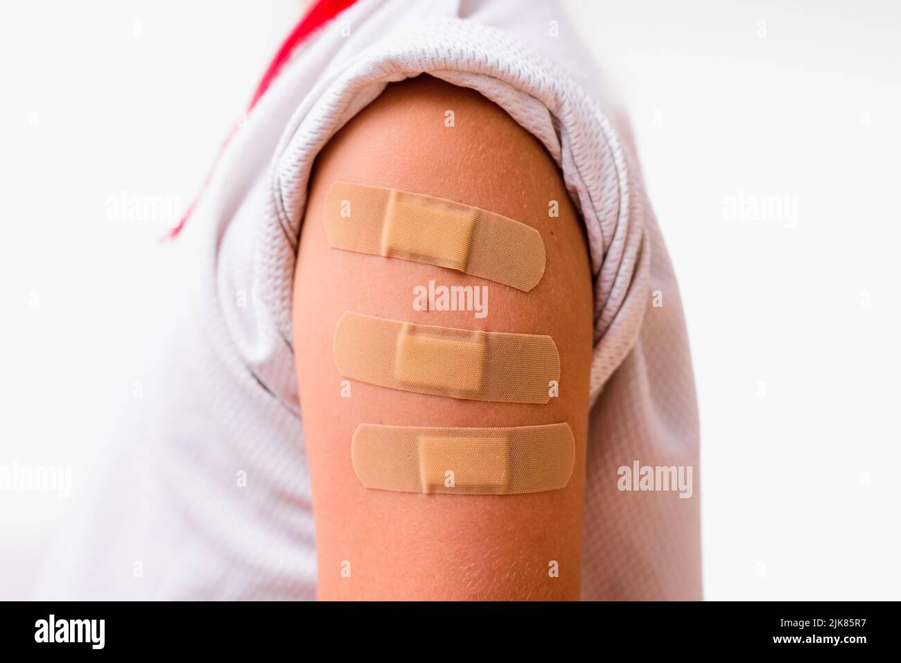 Child's arm with bandaid to calm his pain, isolated on white Stock ...