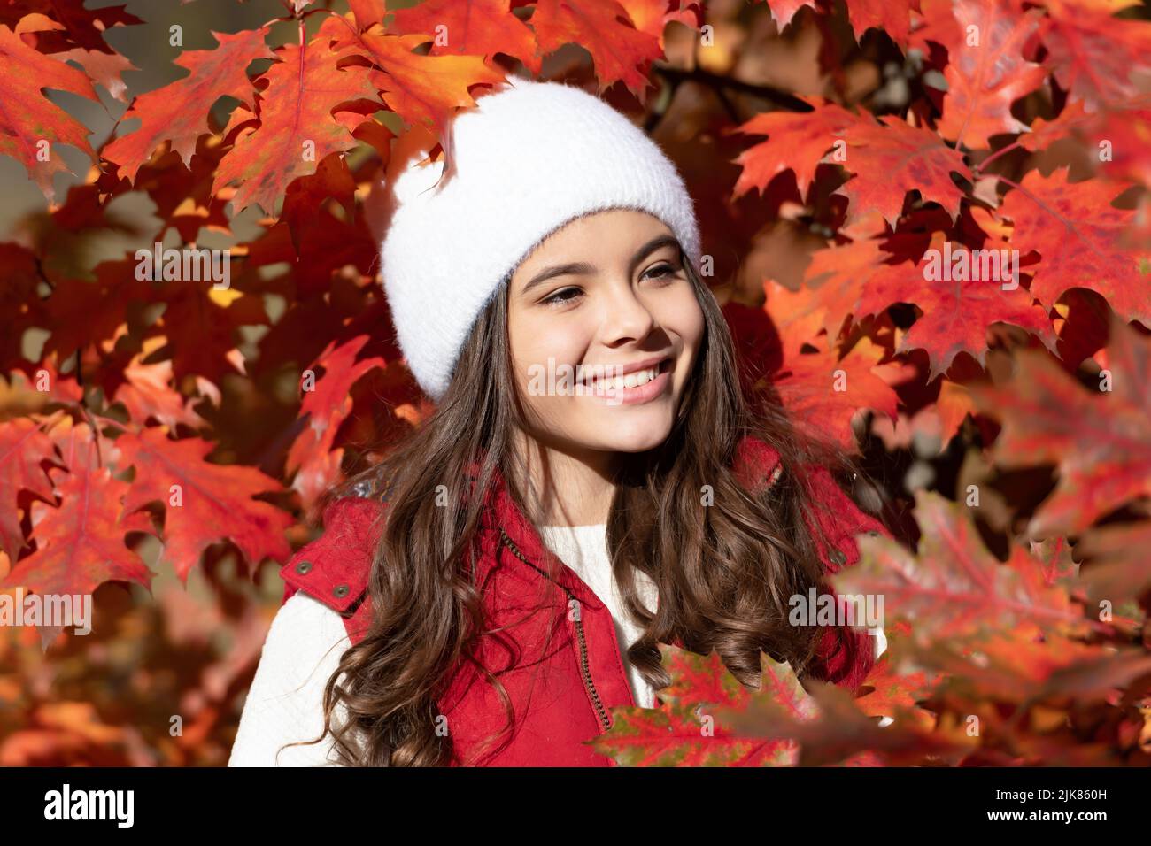 Child teen girl in autumn fall park outdoor, autumn fun kids face ...