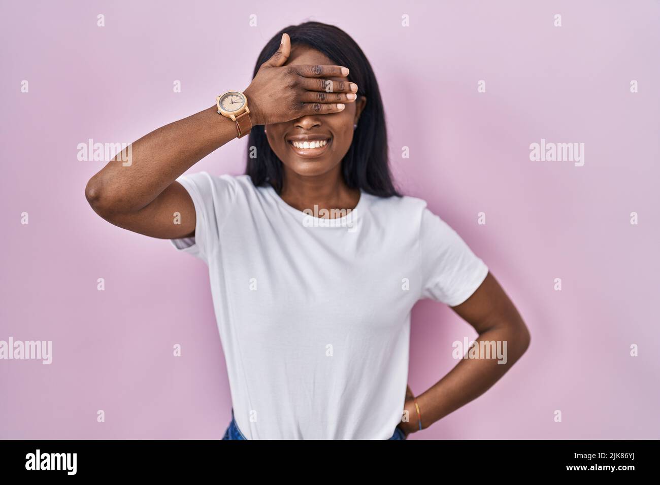 African Young Woman Wearing Casual White T Shirt Smiling And Laughing