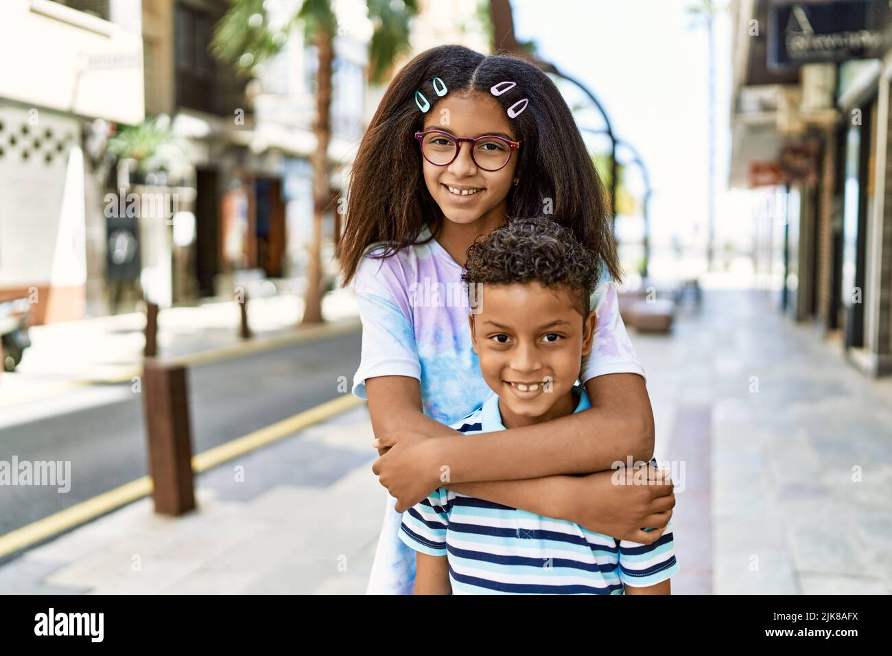 African american brother and sister smiling happy outdoors. Black ...