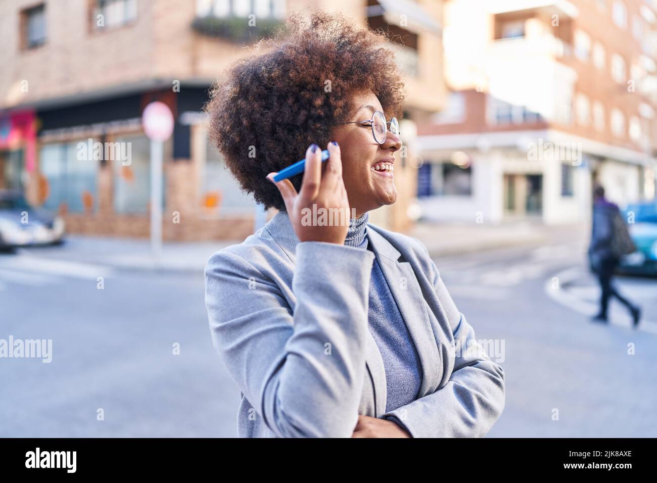African woman listening voice message hi-res stock photography and ...