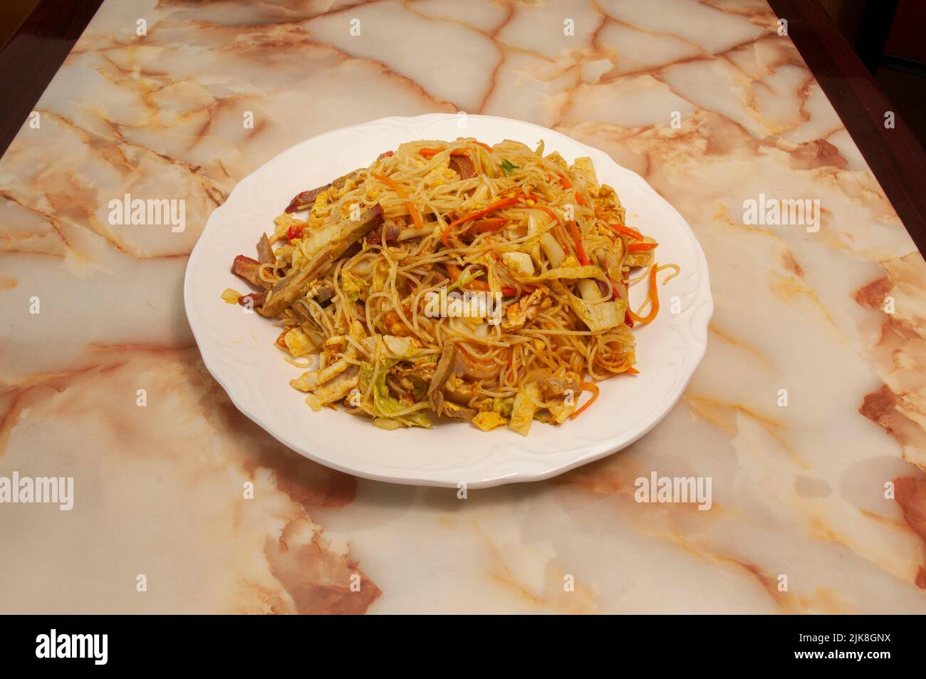 Delicious Asian cuisine dish known as Singapore Mei Fun Stock Photo - Alamy