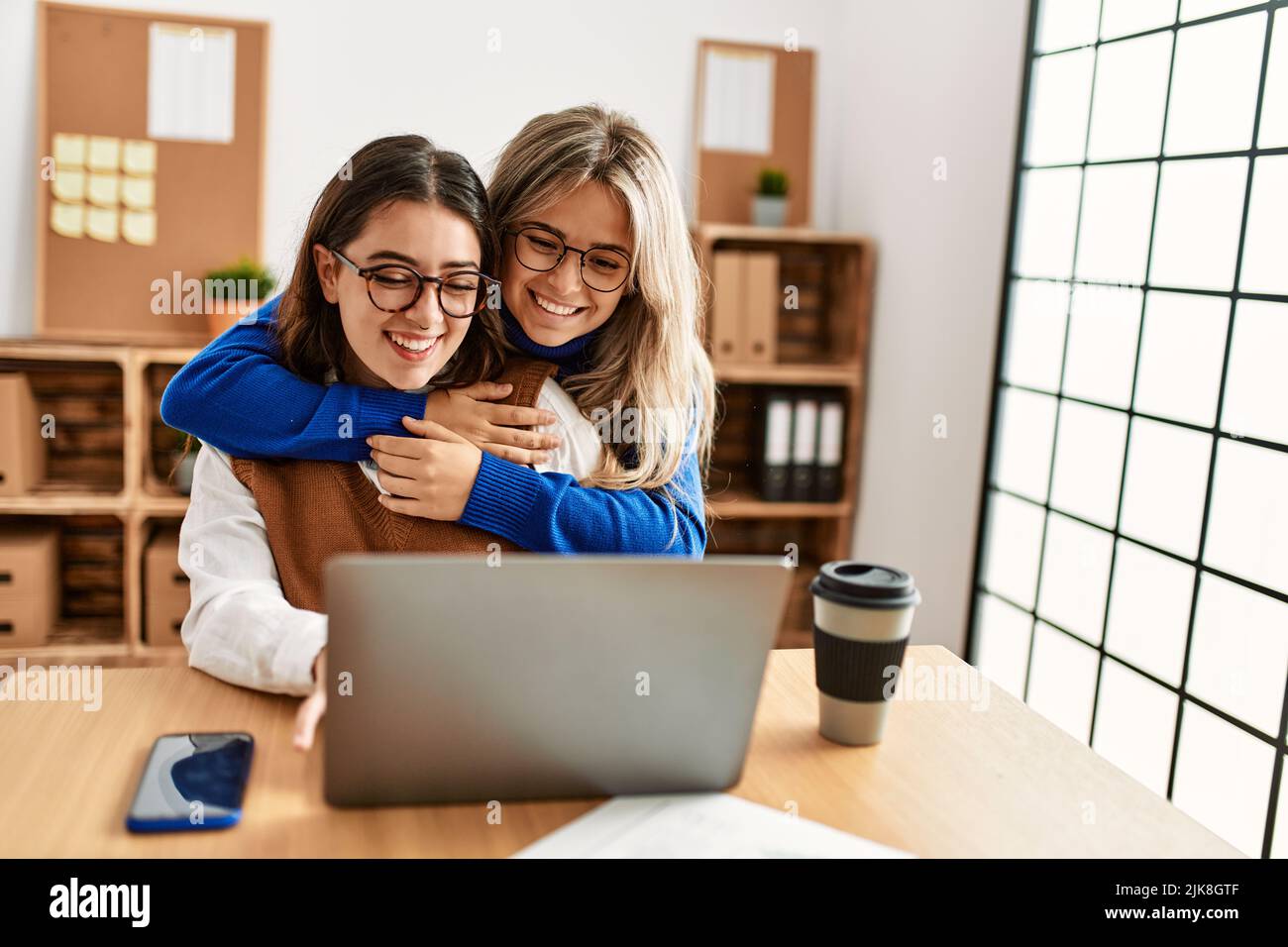 Group hug management hi-res stock photography and images - Alamy