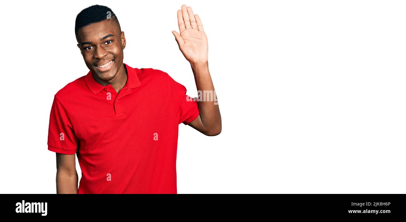 African teen waving isolated hi-res stock photography and images - Alamy