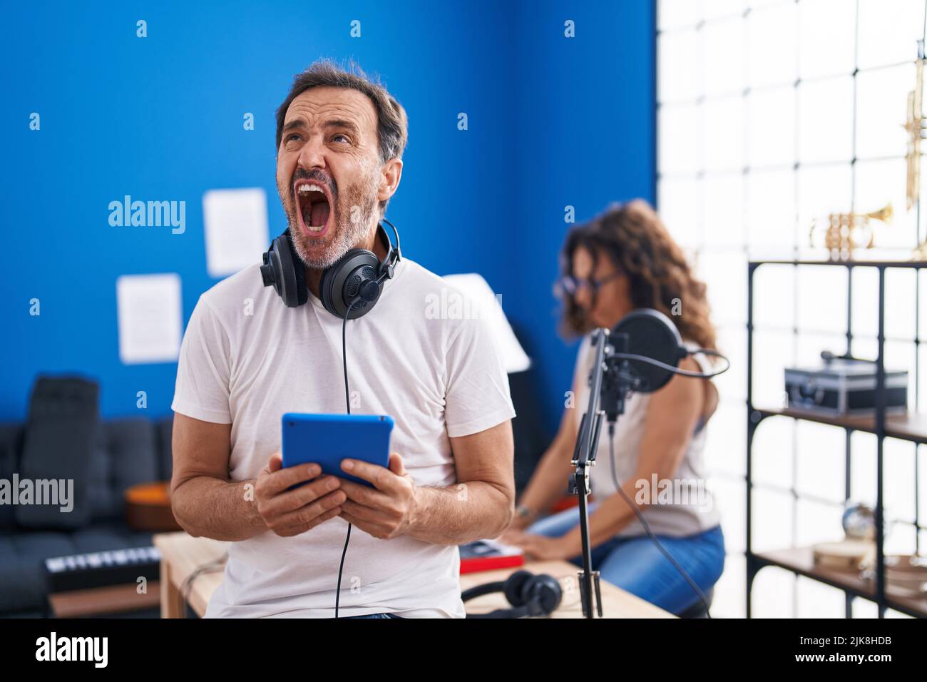Angry man shouting recording hi-res stock photography and images - Alamy