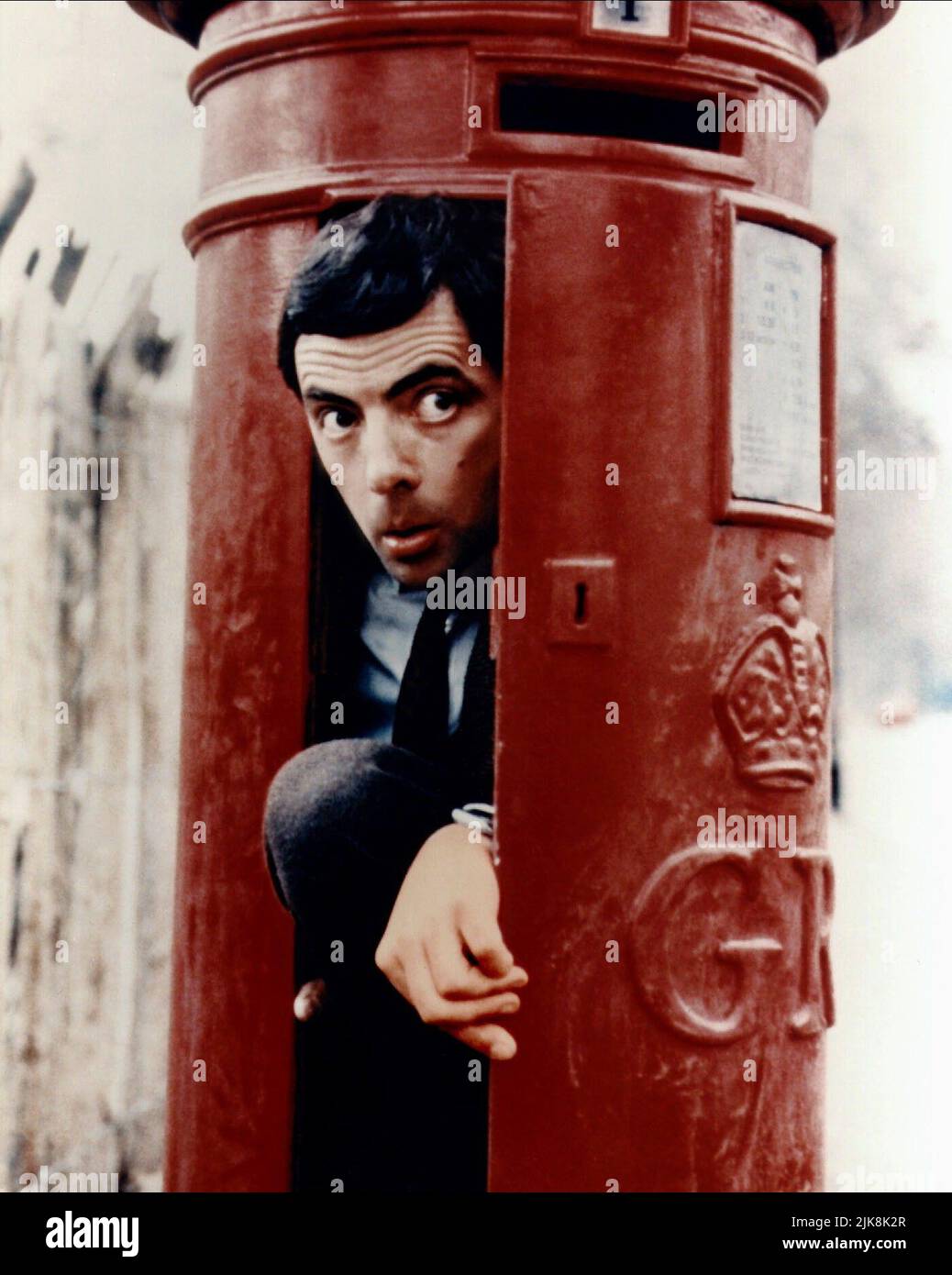 Rowan Atkinson In Post Box Film Mr Bean (1993) Characters: MR. BEAN 01 ...