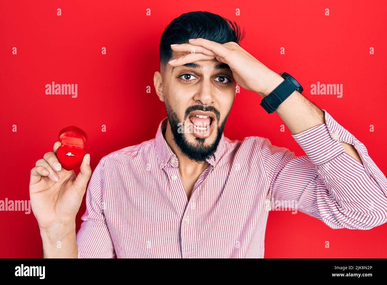 Sad man holding wedding ring hi-res stock photography and images - Alamy