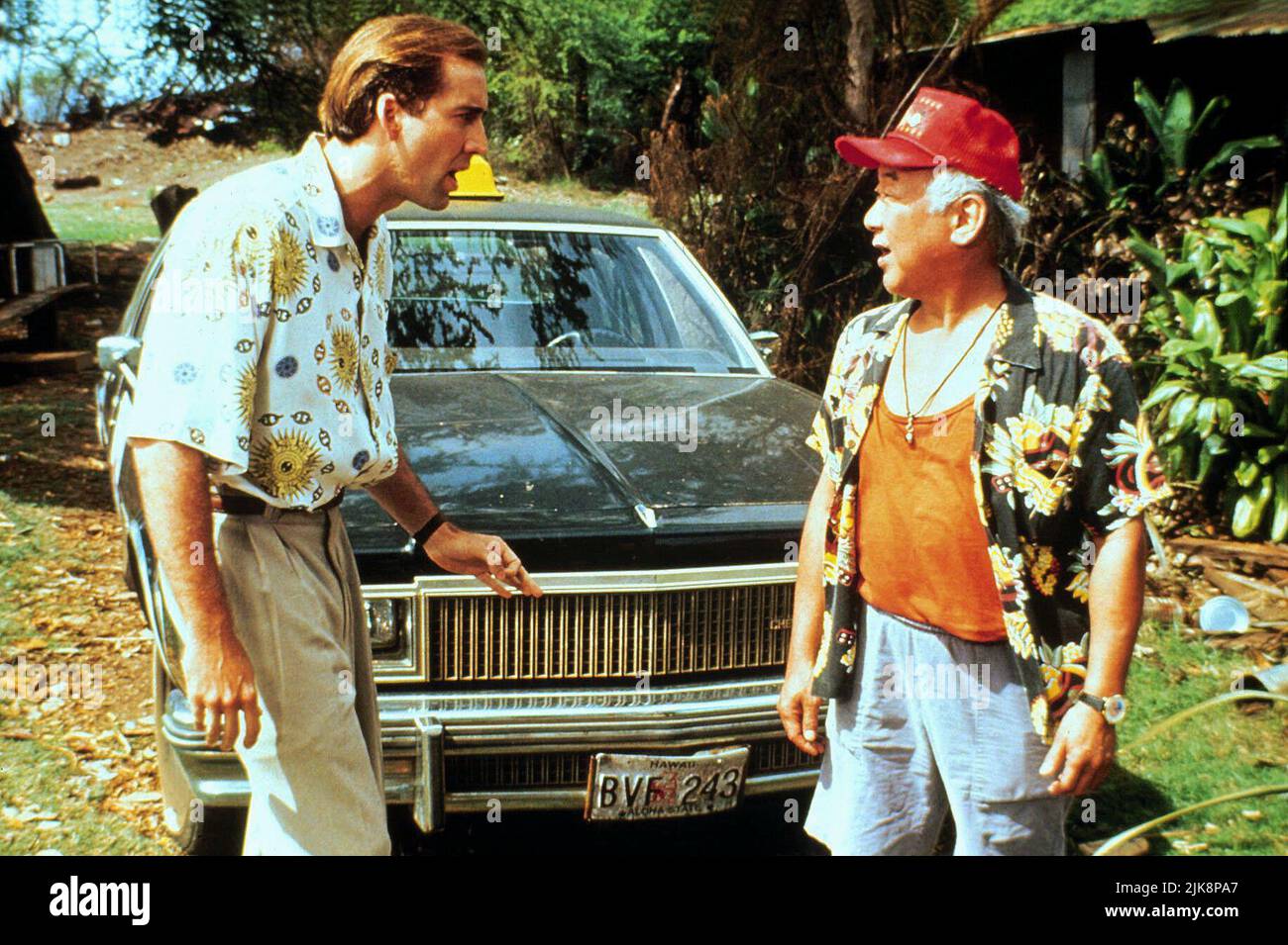 Nicolas Cage & Pat Morita Film: Honeymoon In Vegas (1992) Characters: Jack Singer & Mahi Mahi ...