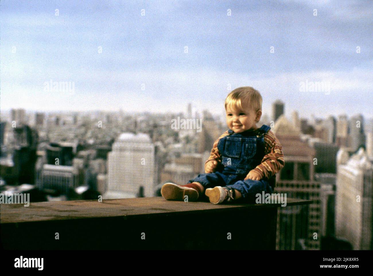 Baby Boy Sit On Steel Girder Film: Baby'S Day Out (1994) Director ...
