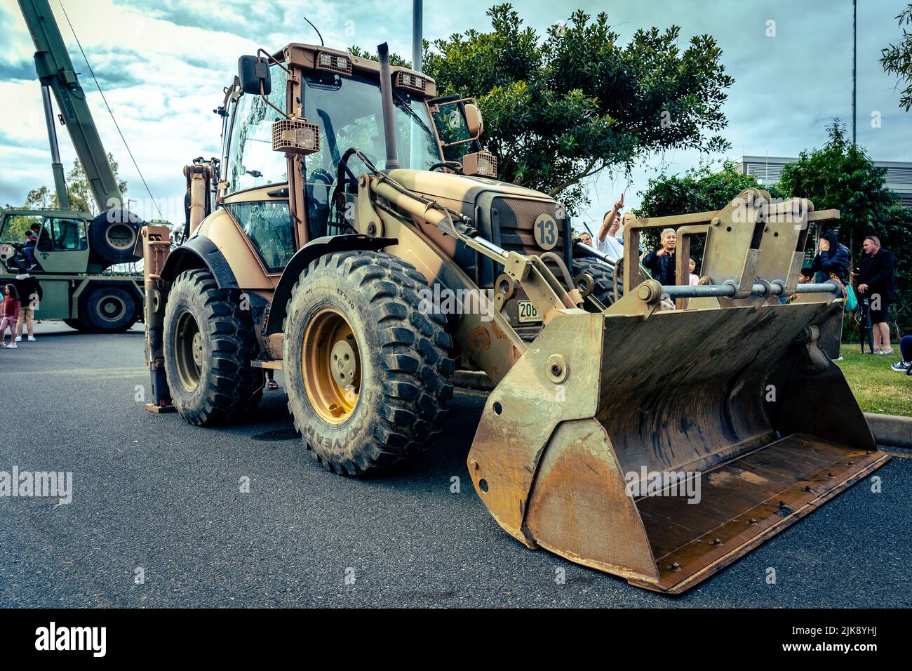 Brisbane, Australia - Military tractor with a scoop Stock Photo - Alamy
