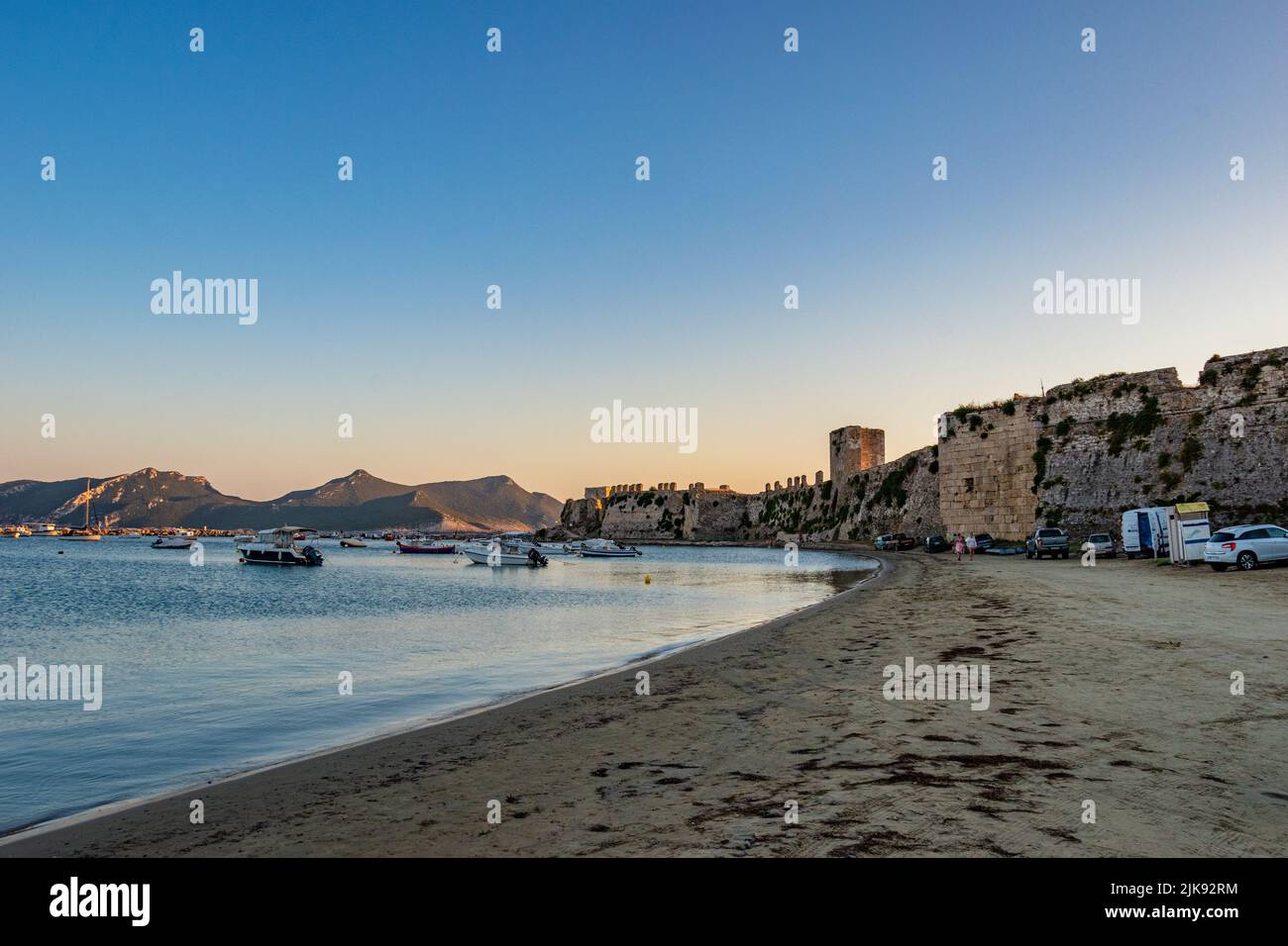 Seaside view of the port of Methini town by the historical castle of ...
