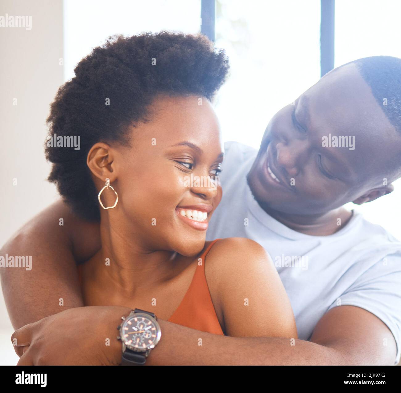 You are my sun, my moon, and all my stars. a young couple hugging in ...