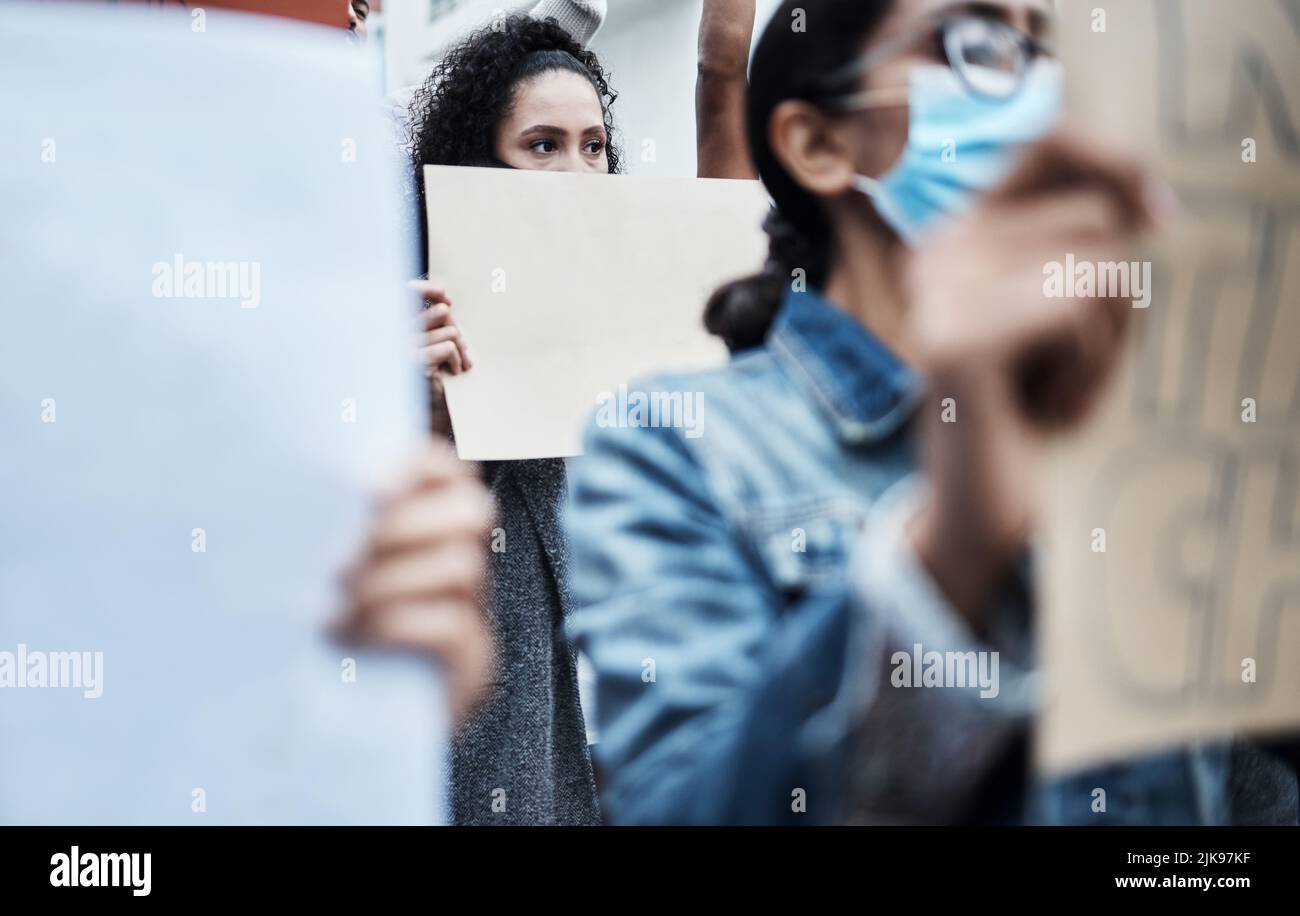 This is our choice. a group of people marching at a corona virus ...