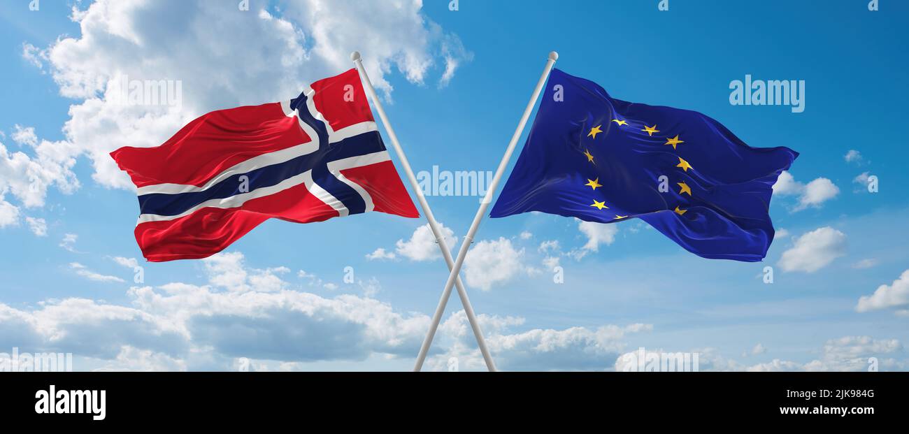 two crossed flags The European Union and Norway waving in wind at ...