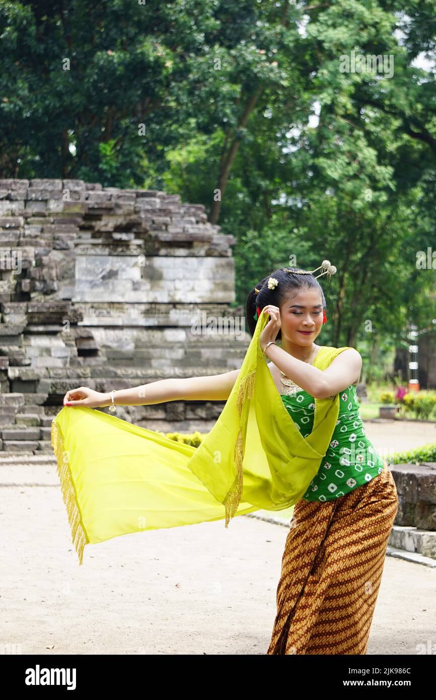 Indonesian traditional dancers with traditional clothes which are ...