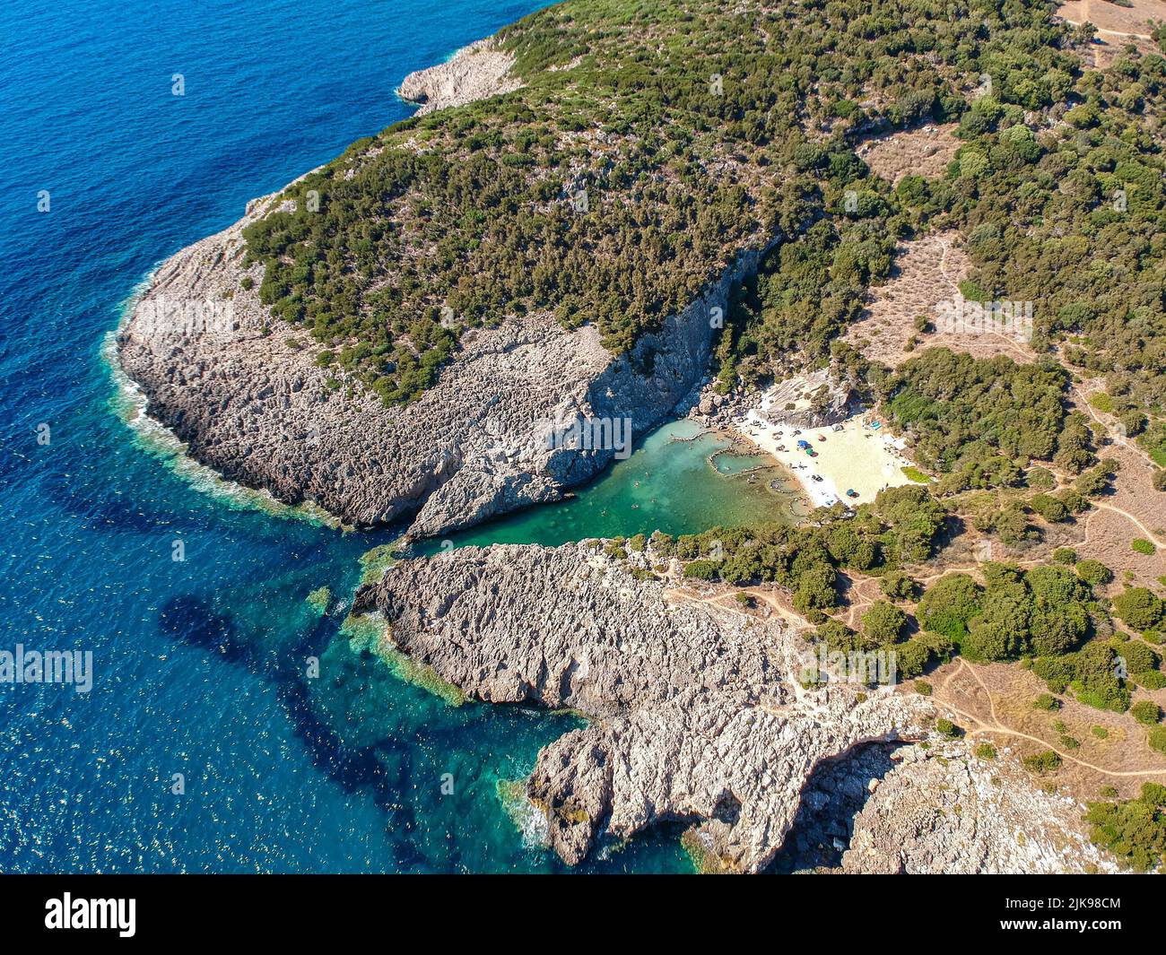 Aerial view of the iconic beach of Glossa near Voidokilia beach in ...