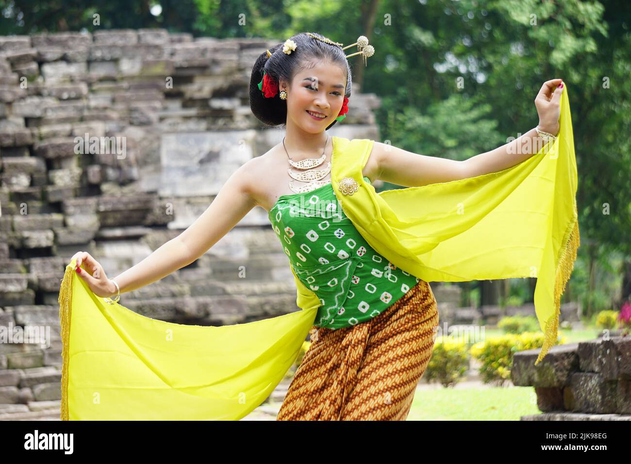 Indonesian traditional dancers with traditional clothes which are ...