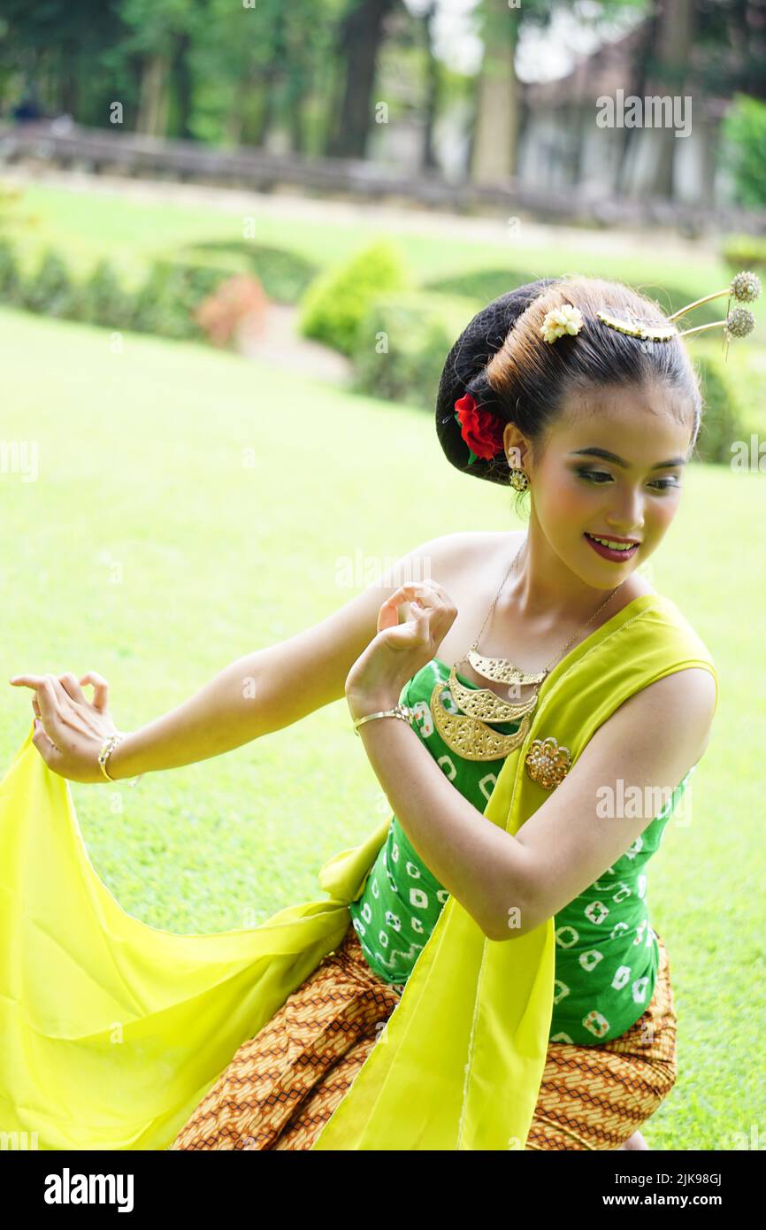Indonesian traditional dancers with traditional clothes which are ...